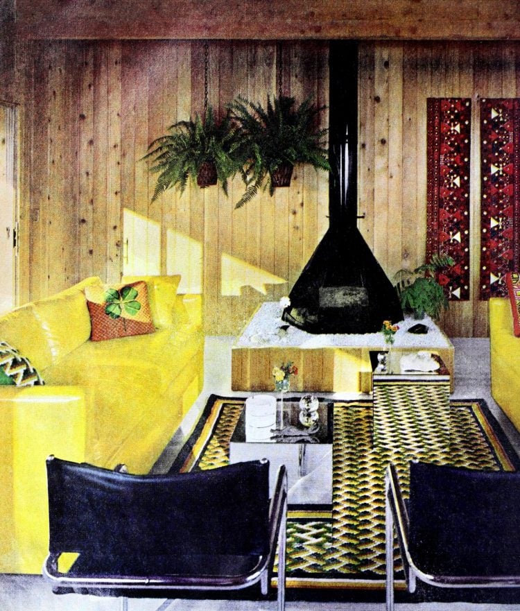 A flat brick fireplace wall dominated this large midcentury modern ...