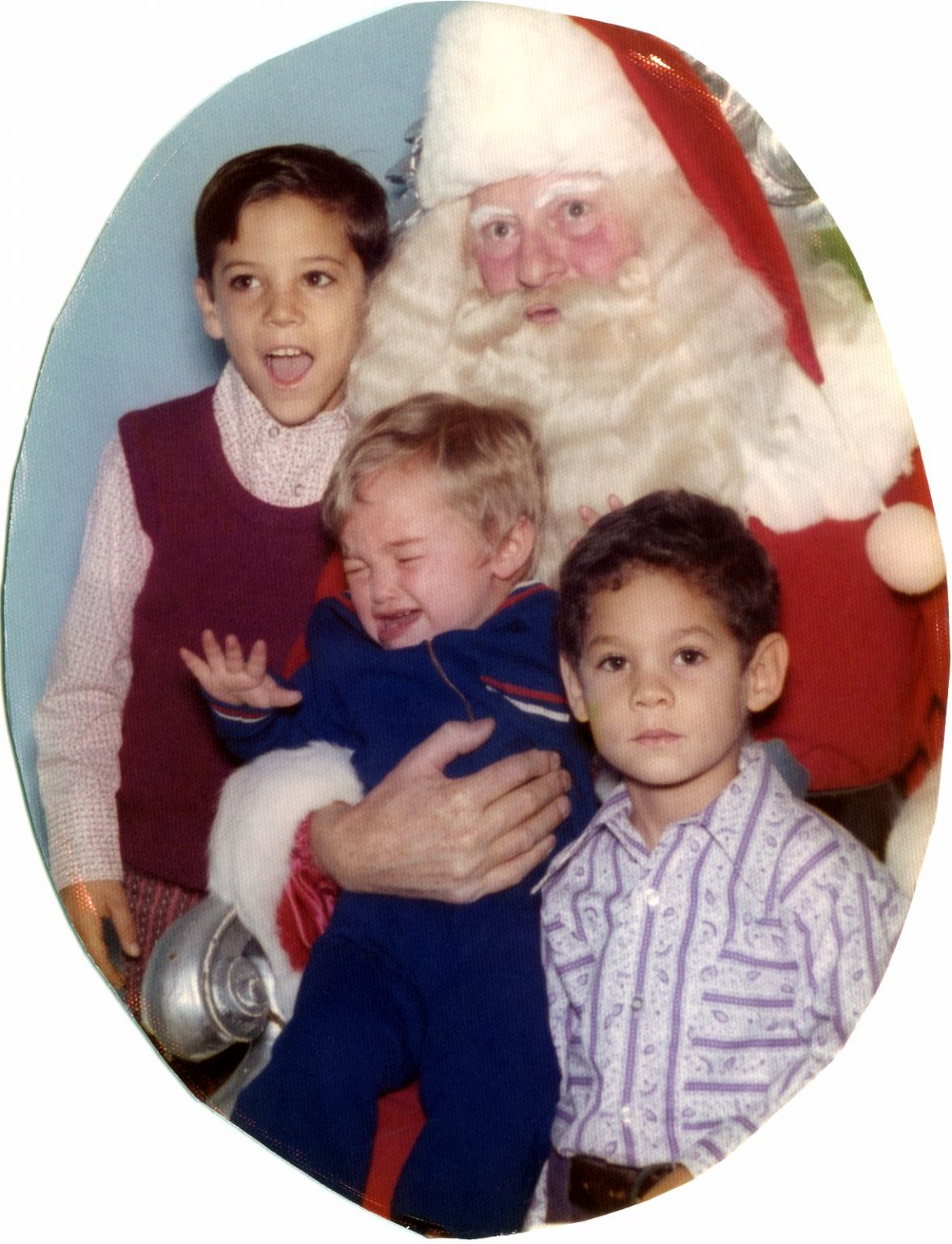 Photos with Santa from decades ago don't really look all that different ...