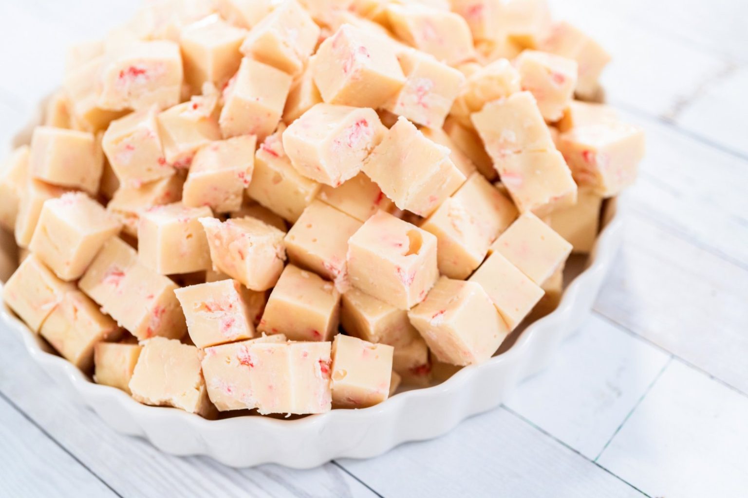 Delicious peppermint fudge with crushed candy canes is an extra festive ...