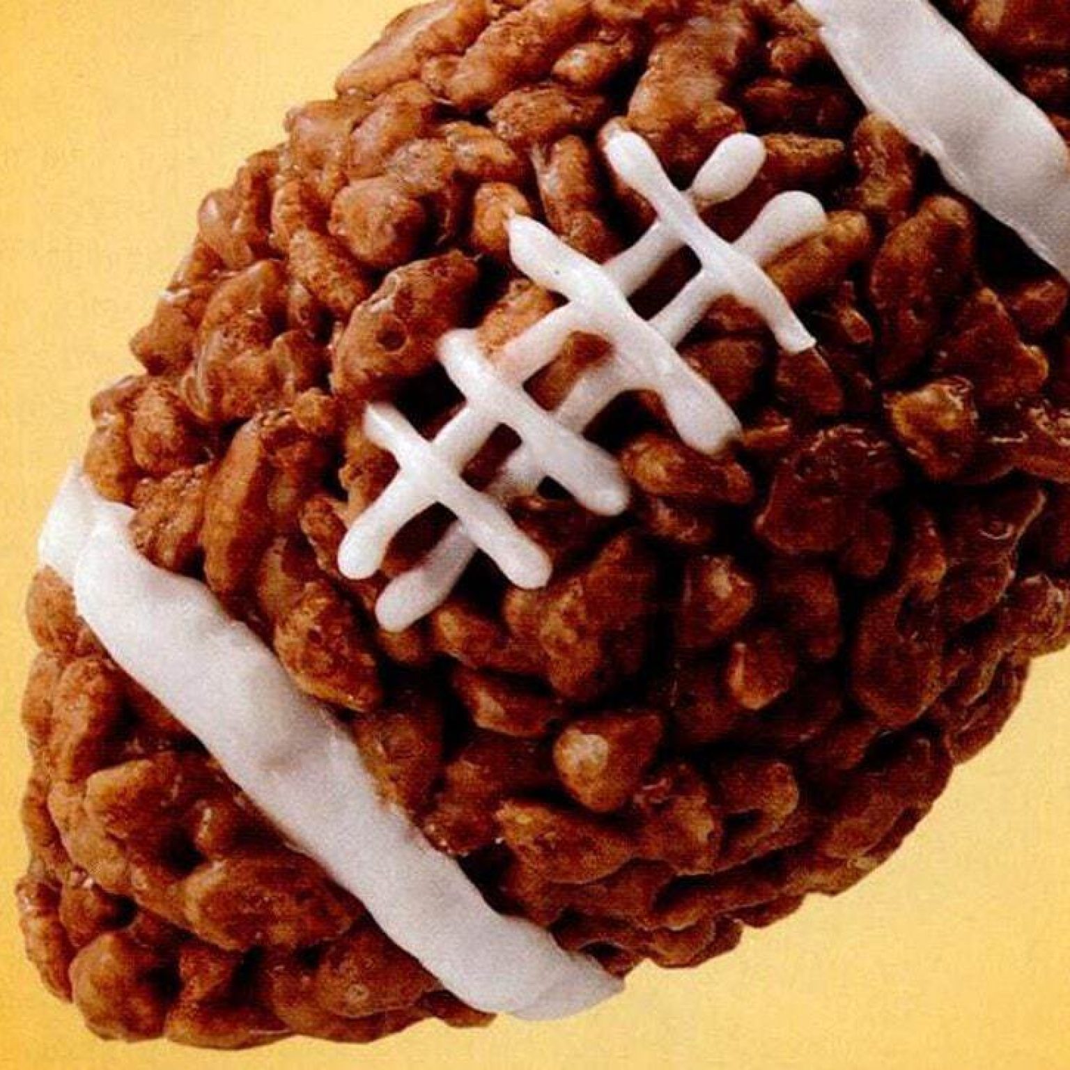 Make these easy peanut butter football Rice Krispie treats from 1996 ...