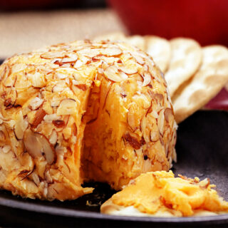 Jeweled cheese ball: Cheddar-brandy appetizer with slivered almonds ...