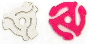 Remember 45 rpm record inserts? See a bunch of those little spindle ...