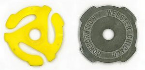 Remember 45 rpm record inserts? See a bunch of those little spindle ...